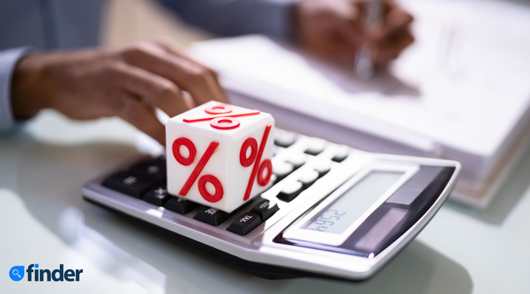 Explained: Paying tax on savings account interest | Finder