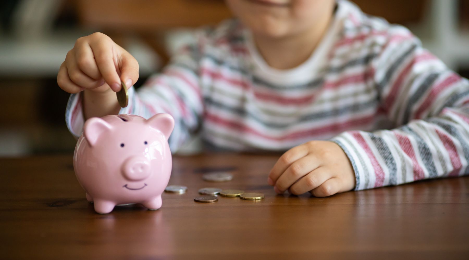 Raiding the piggy bank: 1 in 3 parents dip into their kids’ savings